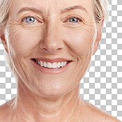 Closeup portrait of a beautiful older woman posing against a purple ...