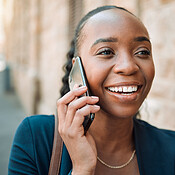 Happy black woman, phone call and walking in city for conversation or ...