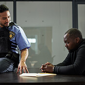 Police, interrogation and black man, suspect or criminal investigation ...