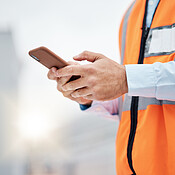 Phone, engineering and hands of man in city for architecture ...