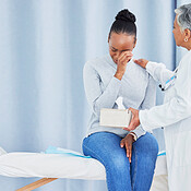 Doctor, patient and sad talk about hospital results of a black woman ...