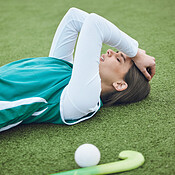 Hockey player, woman is tired in field with fitness and sport ...