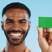 Man, credit card and happy with green screen in studio for mockup, bank ...