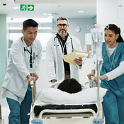 Doctors, people talking and push patient hospital bed, consulting and ...