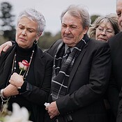 Death, funeral and elderly couple sad together at pain or grief for ...