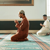 Islamic, praying and holy men in a Mosque for spiritual religion ...