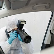 Forensic, investigation and photography of evidence in crime scene car ...