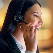 Woman, telemarketing and consulting at night in office for customer ...