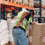 Pallet truck, man and back pain in warehouse with transport, safety and ...