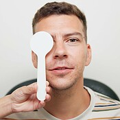 Cover, vision and man in portrait for eye exam, optometrist and test ...