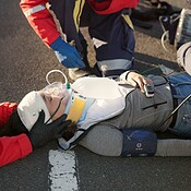 Paramedic, oxygen and outdoor with patient, healthcare and rescue of ...