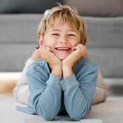 Portrait happy child looking at camera with smiling face. Adorable ...