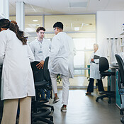 Innovation, science and group of people in laboratory for work on ...