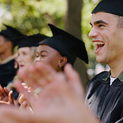 Education, man and students clapping hands at graduation for academic ...