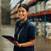 Portrait, woman and tablet at warehouse for distribution industry ...