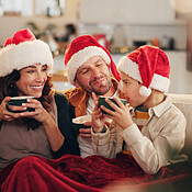 Christmas, family and happy on sofa with hot chocolate, coco and relax ...