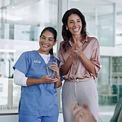 Happy nurse, award and team with applause for congratulations ...