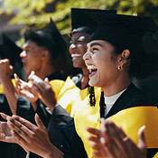 Students, excited and applause at university for graduation, peer ...