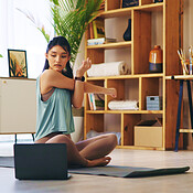 Stretching arms, laptop and woman for zen, active and spiritual ...