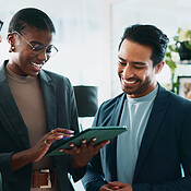 Teamwork, planning and tablet with business people in office for ...