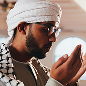 Religion, prayer hands and Muslim man in Mosque for praying, worship ...