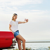 Road trip, happy girl and selfie with car for travel, vacation or ...