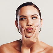 Woman, thinking and pout for skincare in studio for natural beauty ...