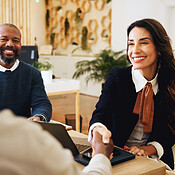 Teamwork, handshake and meeting with business people in office for ...