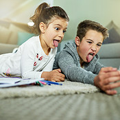 Playing a silly game online | Buy Stock Photo on PeopleImages, Picture ...