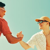Smile, men and friends for handshake on beach of greeting, meeting and ...
