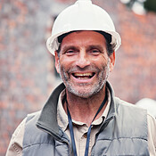 Construction, happy and portrait of man in city for inspection ...