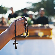 Funeral, hands and person with rosary, death and symbol for religious ...