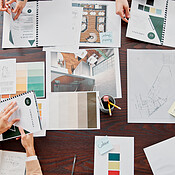 Meeting, above and documents with hands of business people for interior ...