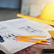 Architecture, blueprint and drawing tools on table for renovation ...