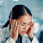 Woman, headache and stress at lab for science, study and burnout with ...