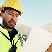 Blueprint, reading and engineering with man in city for progress report ...