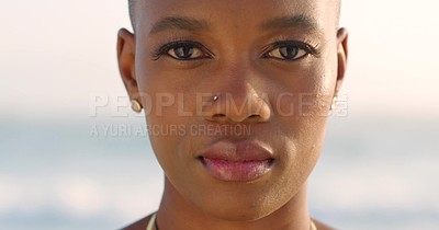 Portrait of an African woman on the beach during spring for sunlight ...