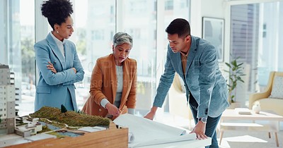 Architecture, team and collaboration of architects talking blueprint ...