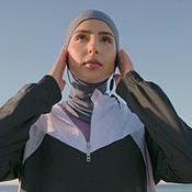 Fitness, running and face of muslim woman with headphones for music ...