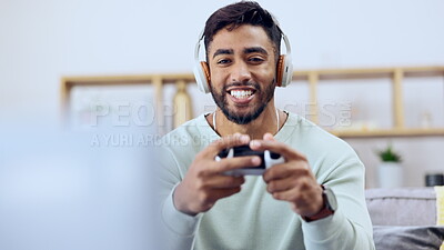 Gaming, winner and esports with a man in the living room of his home ...