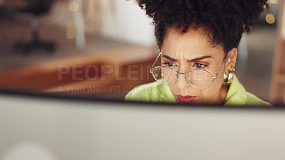 Black woman, computer reading and serious employee in a office working ...