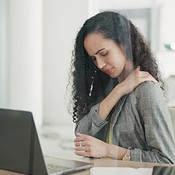 Shoulder pain, office and business woman with laptop with strain, joint ...