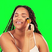 Happy woman, cheek and makeup brush on green screen, studio and ...