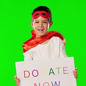 Green screen, superhero and child with poster for donation, charity and ...