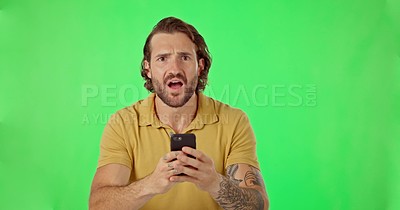 Face, green screen and man with smartphone, frustrated and angry ...