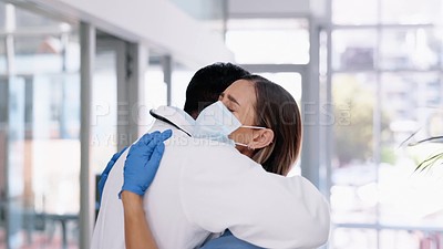 Doctor, sad woman and crying with hug in support for grief, loss or ...