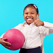 Happy, sports and child with a thumbs up on a blue background for ...