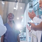 Healthcare, doctor team and cheering with success and planning in a ...