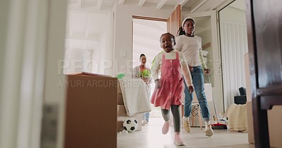 Children, moving in and running in family home with boxes and plants at ...