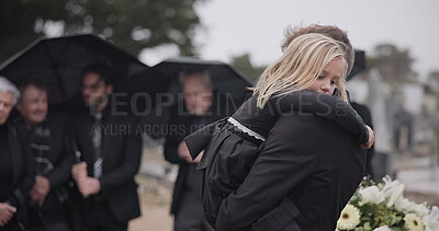 Sad, hug and a father and child at a funeral with depression and ...